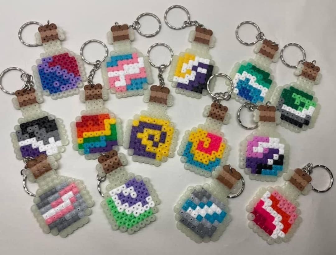 Charity Pride NIGHT GLOW Potion Bottle Keychain - Etsy