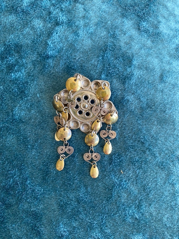 Traditional brooch store