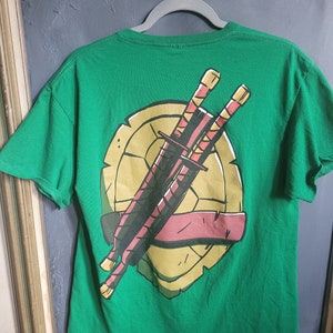 TMNT Teenage Mutant Ninja Turtles Shell T-shirt - Graphics on Front ...