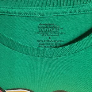 TMNT Teenage Mutant Ninja Turtles Shell T-shirt - Graphics on Front ...