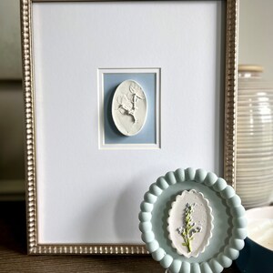 Framed Bas Relief Botanical Flower Intaglio Against a Powder Blue ...