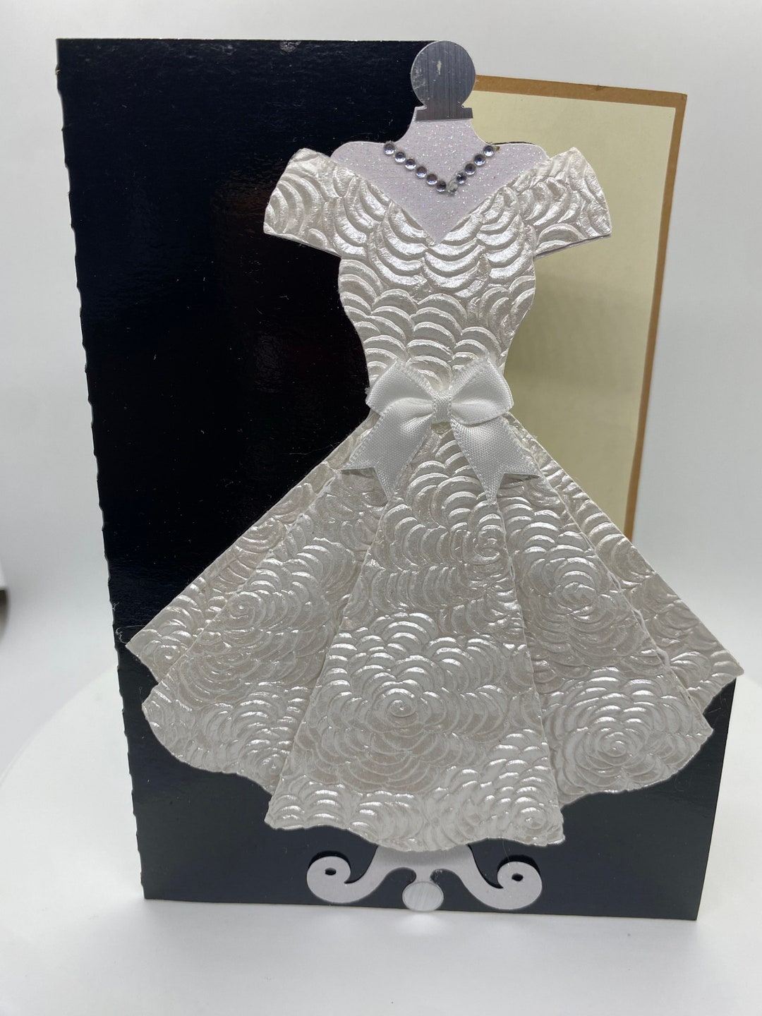 Elegant White Embossed Dress Card on Black Cardstock With White Bow at ...