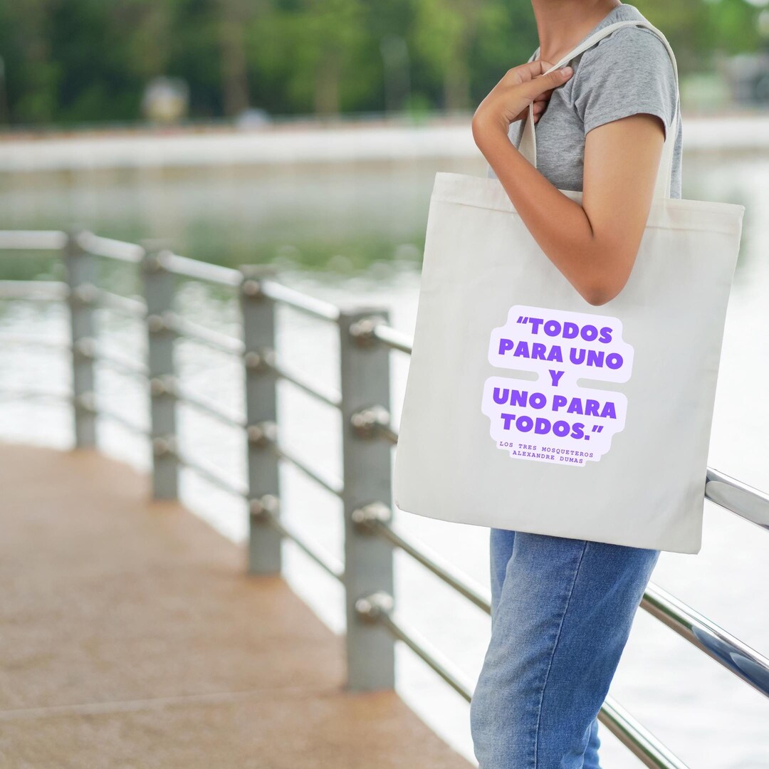 Tote Bag With the Three Musketeers Slogan in Spanish - Book Quote ...