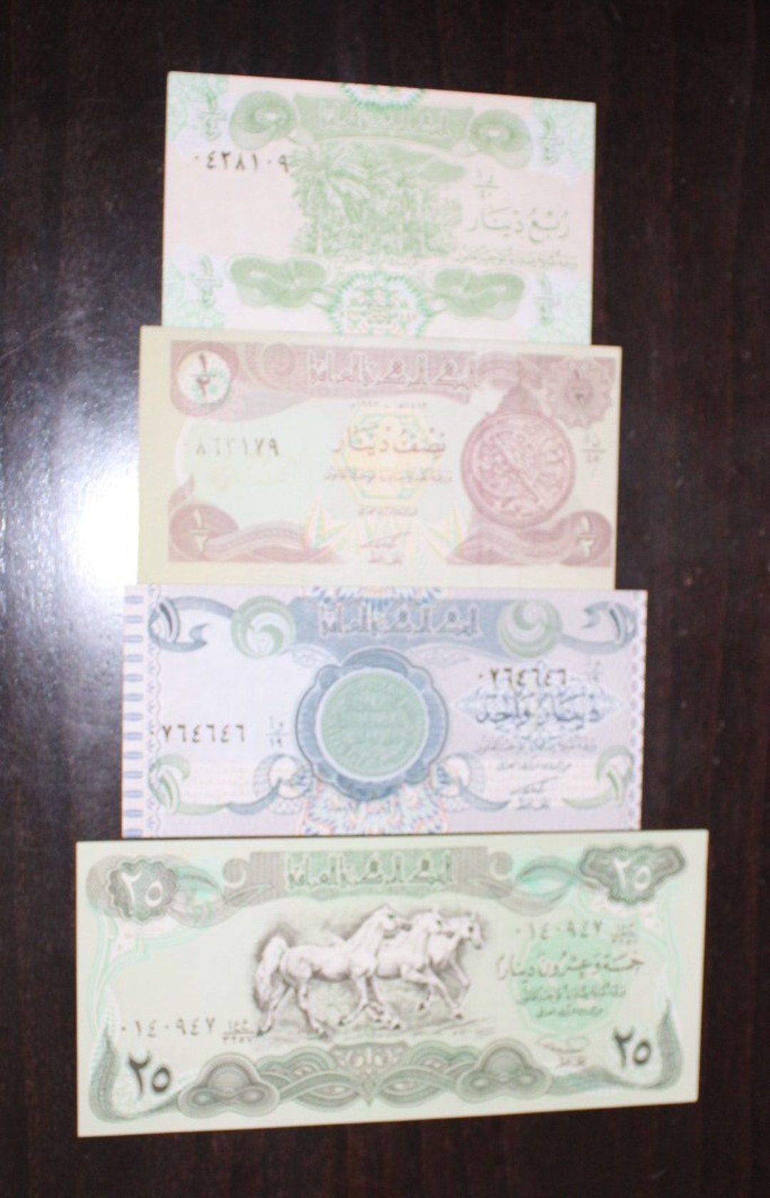 Iraq. Lot of 4 Saddam Hussein Banknotes unc. Emergency Issues ...