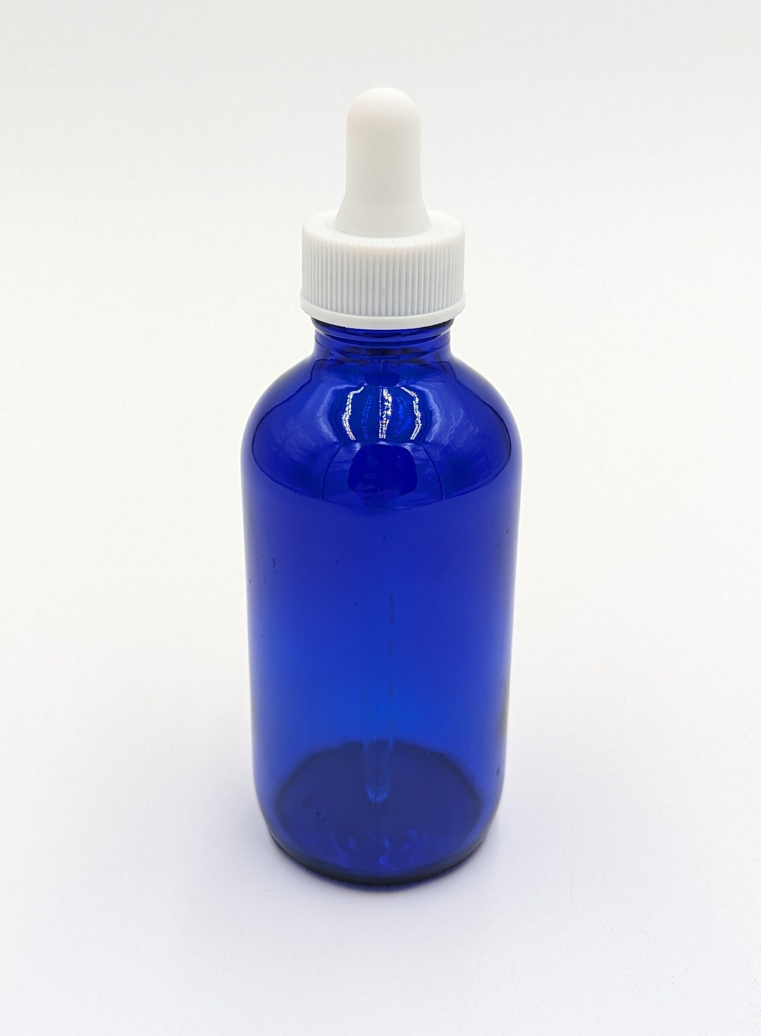 Craft Bottle Cobalt Blue Glass Bottle With White Bulb Glass Metered ...