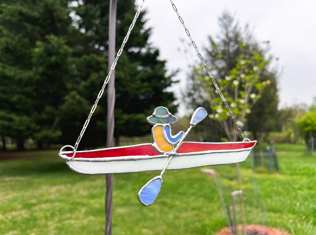 Stained Glass Kayak in Red With a Figure Wearing a Hat and Life Vest ...