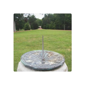 In 'focus', the Arm of the Sundial Stands Prominently, a Symbol of Time ...