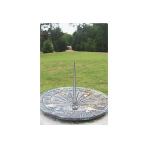 In 'focus', the Arm of the Sundial Stands Prominently, a Symbol of Time ...
