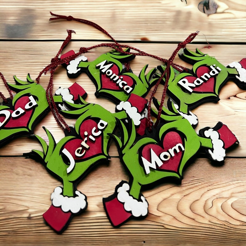 Grinch mano corazon - Etsy México