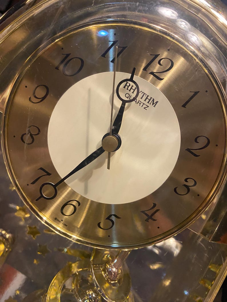 Rhythm Quartz Mantle Clock #4SG607 | Silent Rotating Pendulum | Stars ...