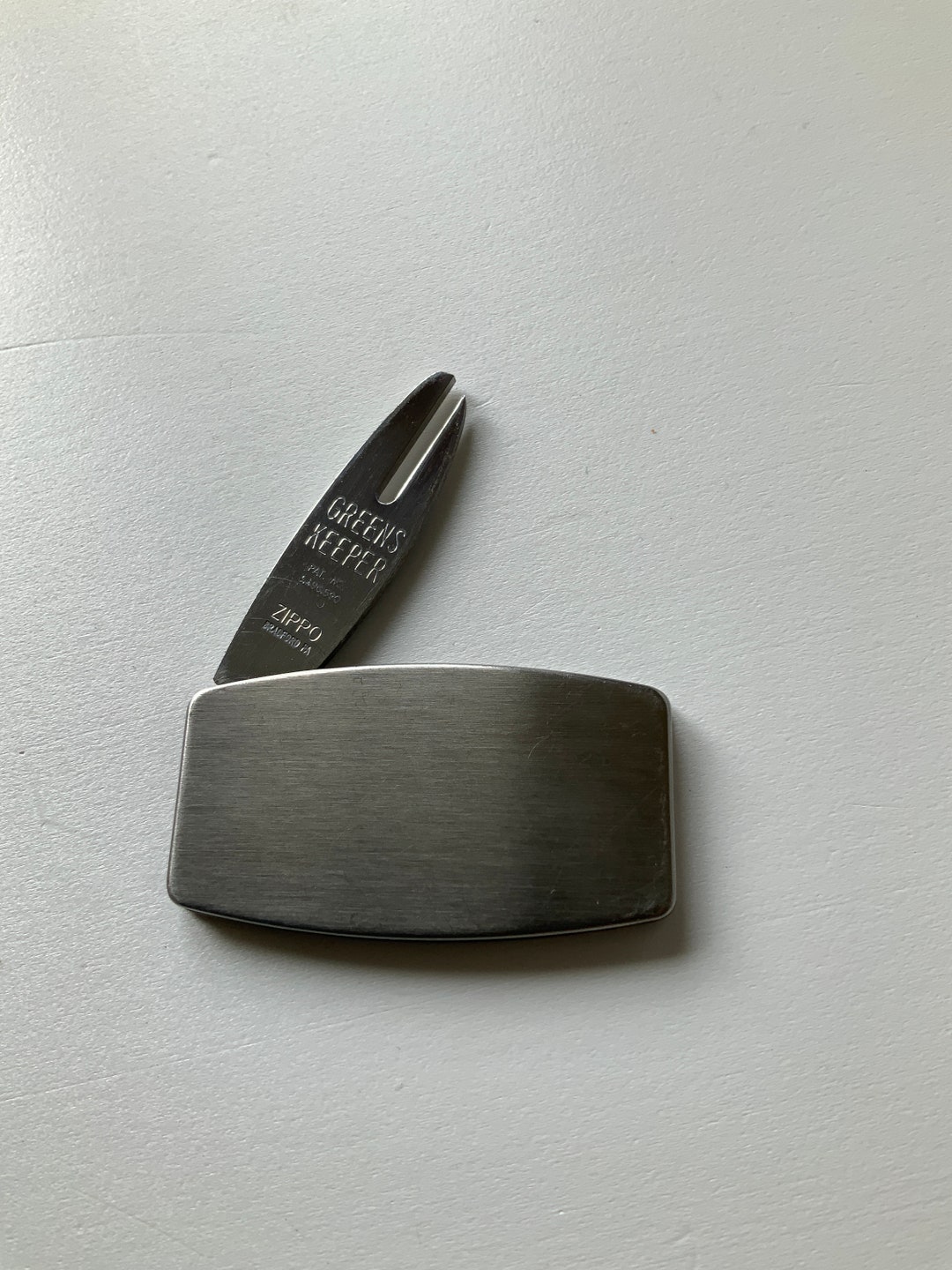 Zippo Greens Keeper. Quality!! Ad Piece. SGI Canada. Golf. Cleat ...