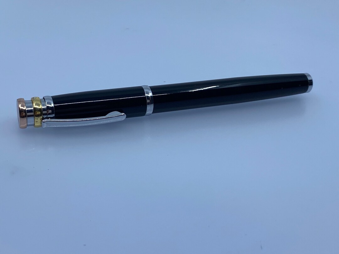 Cartier Trinity Fountain Pen Timeless Elegance in Black Resin and ...