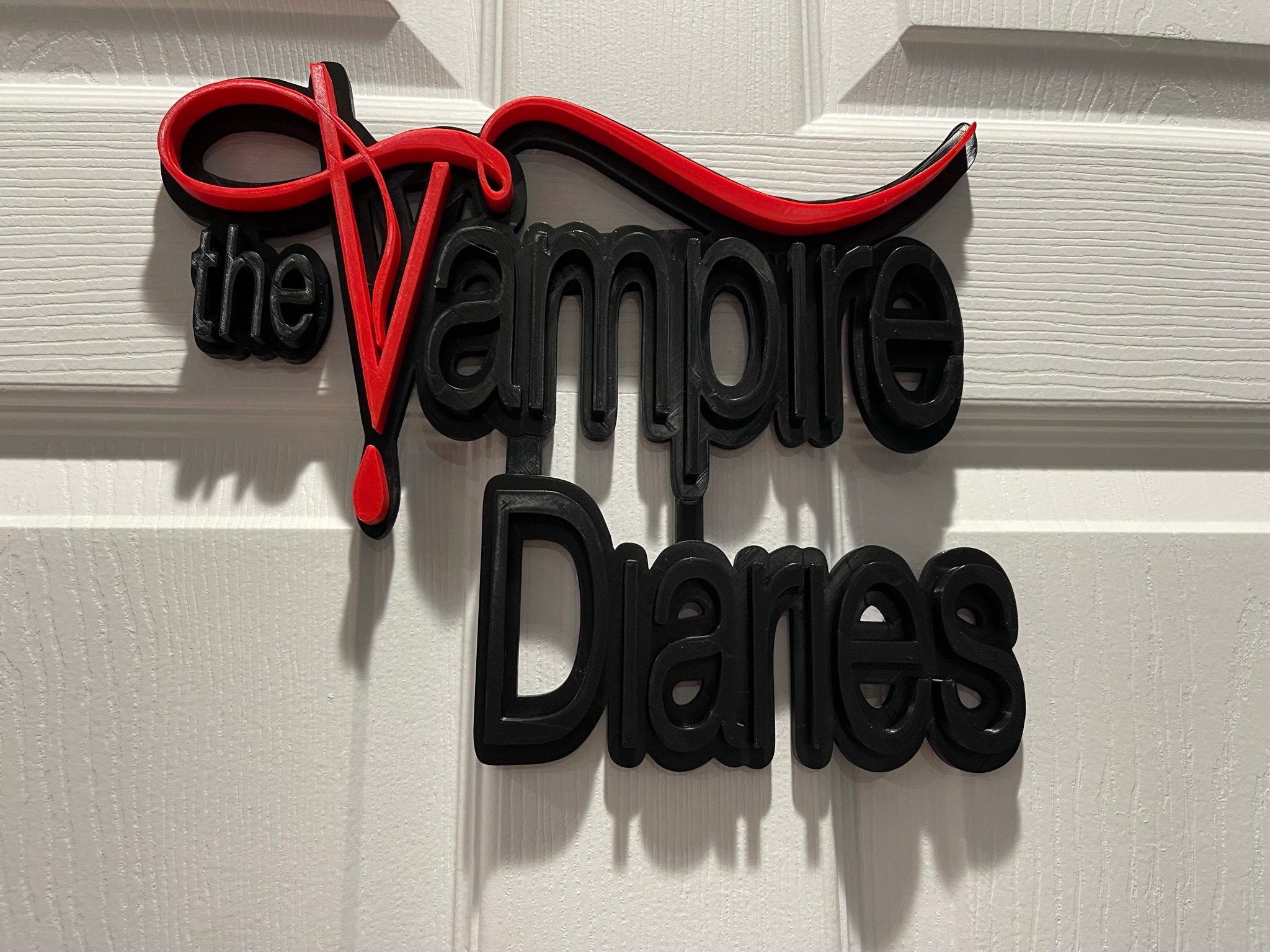 The Vampire Diaries Wall Display - Black | Red V | Sizes: Regular ...