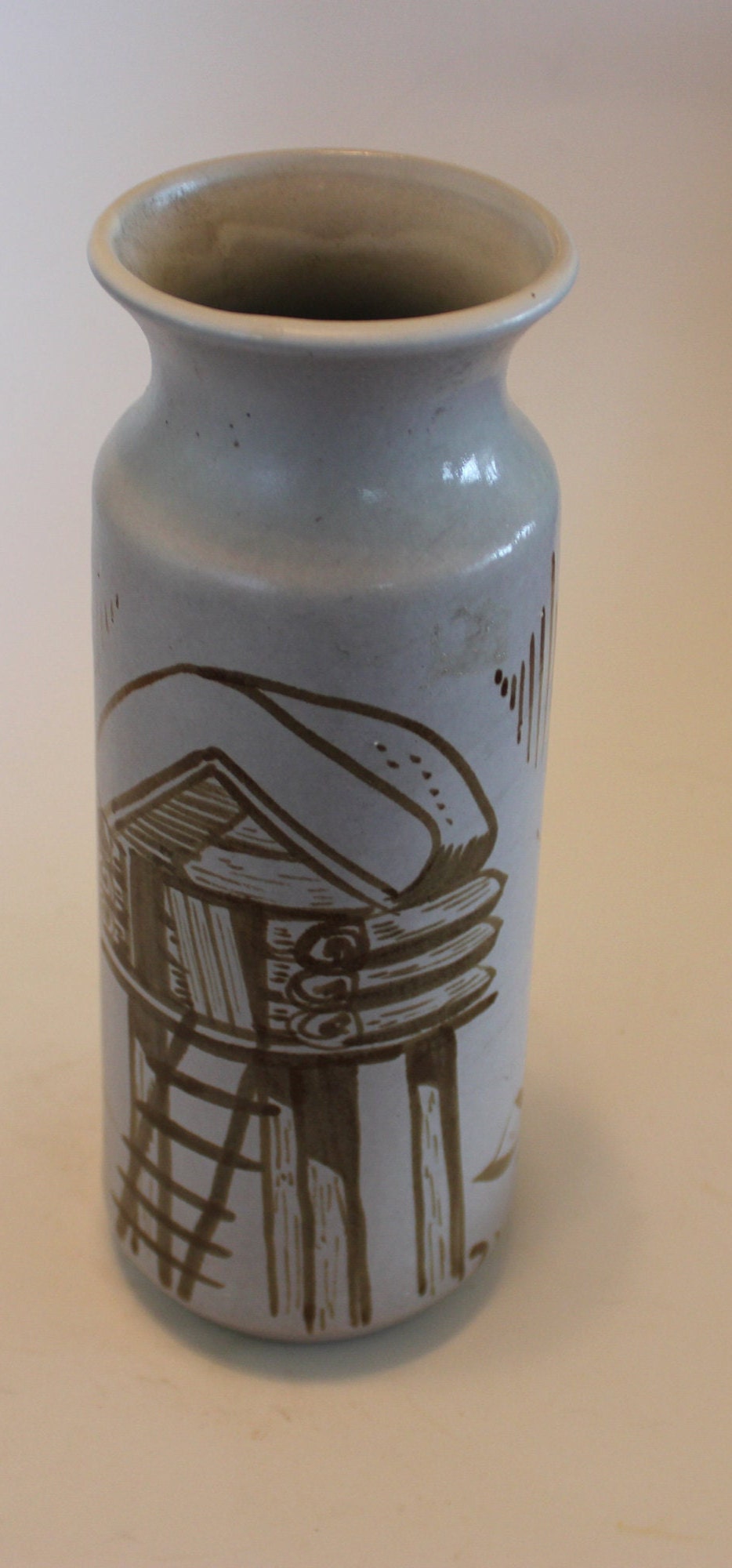 Tall Pottery Vase Marked 'made in USA 20', Depicting an Elevated Cabin ...