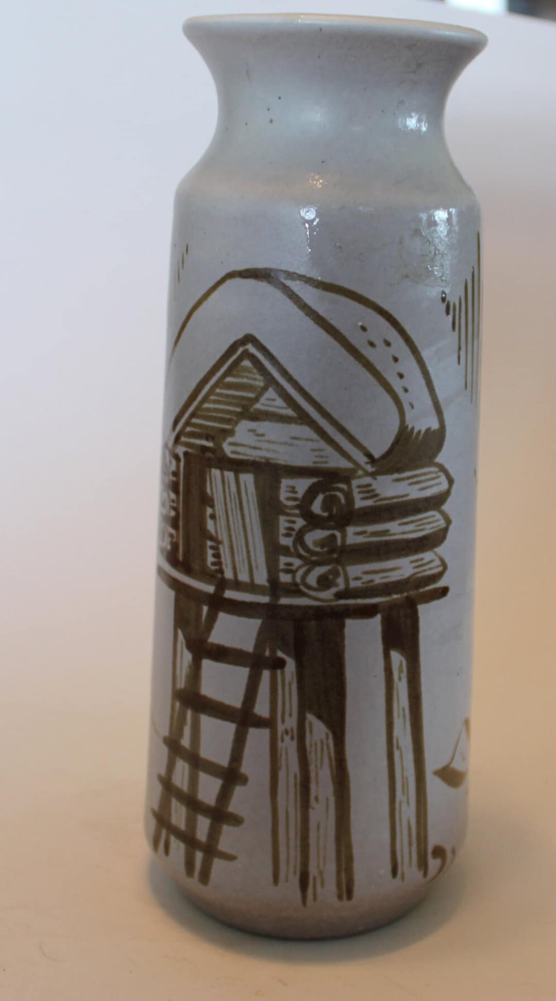 Tall Pottery Vase Marked 'made in USA 20', Depicting an Elevated Cabin ...