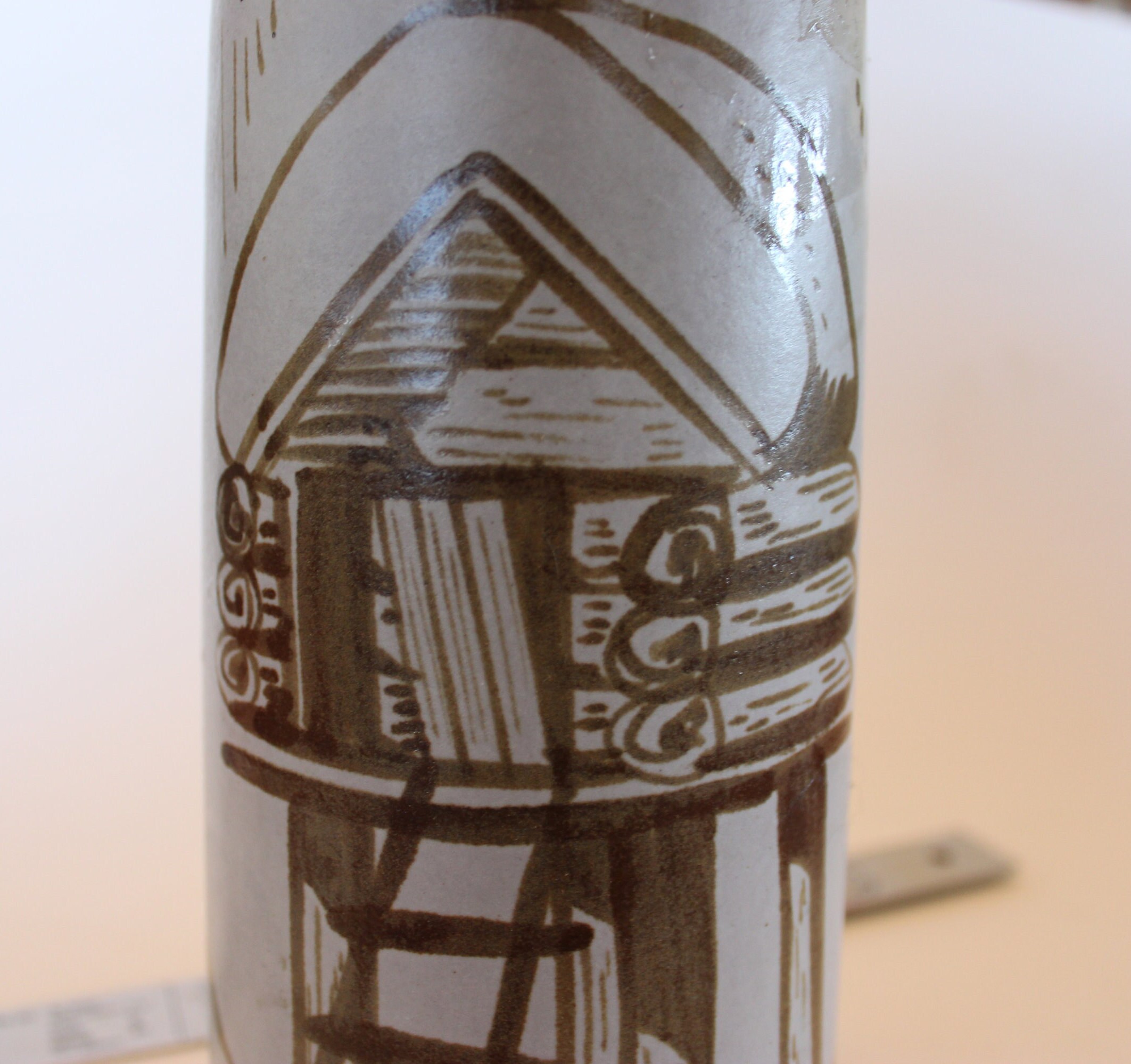 Tall Pottery Vase Marked 'made in USA 20', Depicting an Elevated Cabin ...