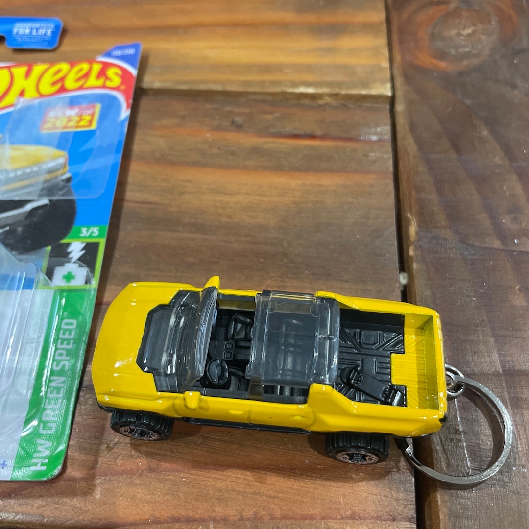 This Hot Wheels GMC Hummer EV Yellow Green Speed 2022 First Edition ...