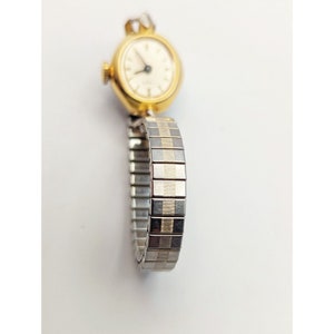 Vintage Timex Ladies Gold Tone Manual Analog Runs Silver Tone MCM Keeps ...