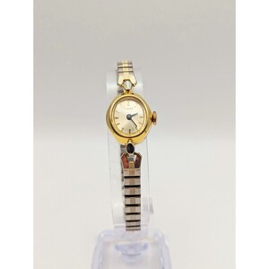 Vintage Timex Ladies Gold Tone Manual Analog Runs Silver Tone MCM Keeps ...