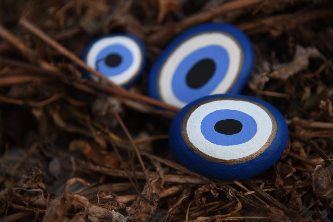 Enchanted Gaze: Hand-painted Evil Eye Pebble - Etsy