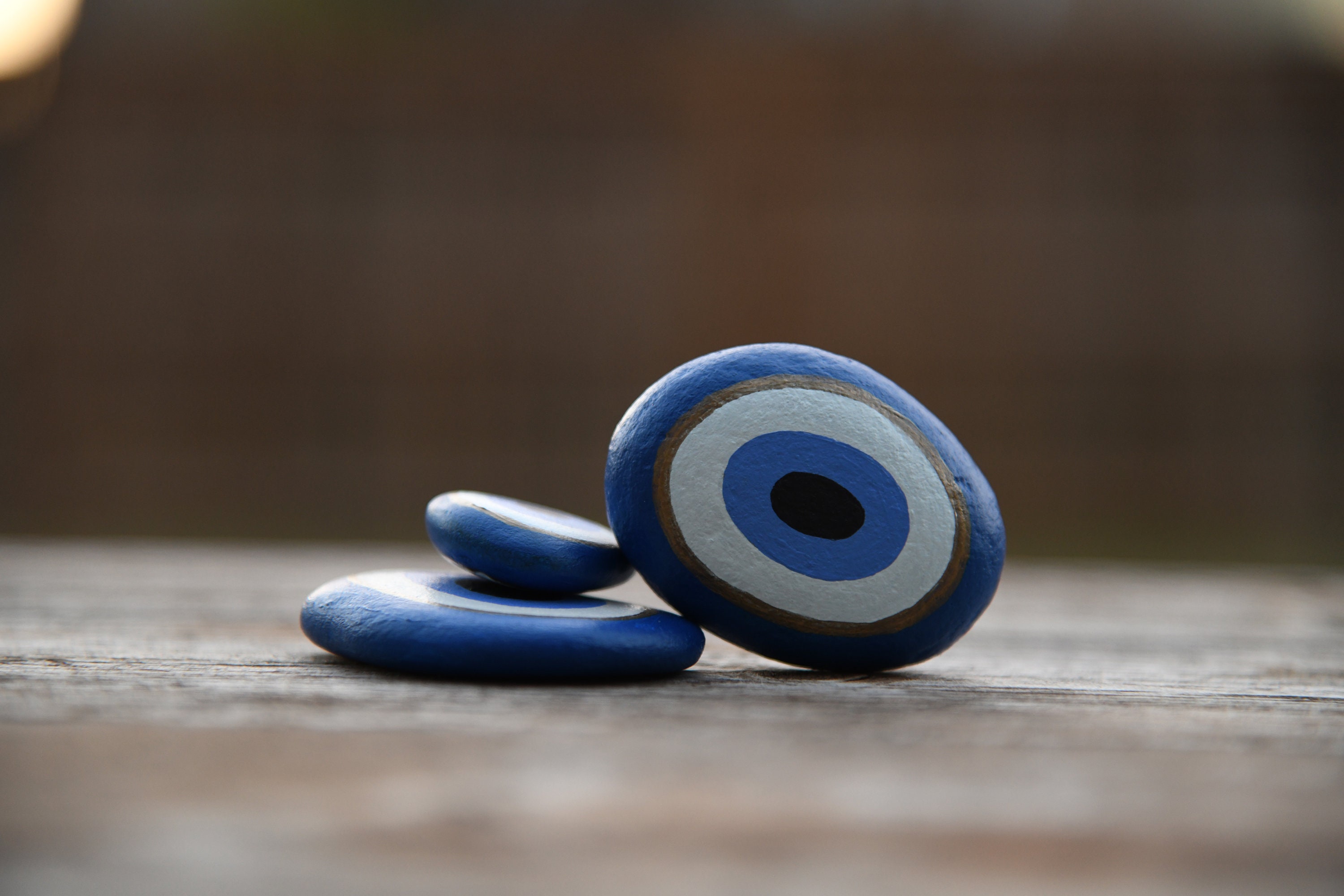 Enchanted Gaze: Hand-painted Evil Eye Pebble - Etsy