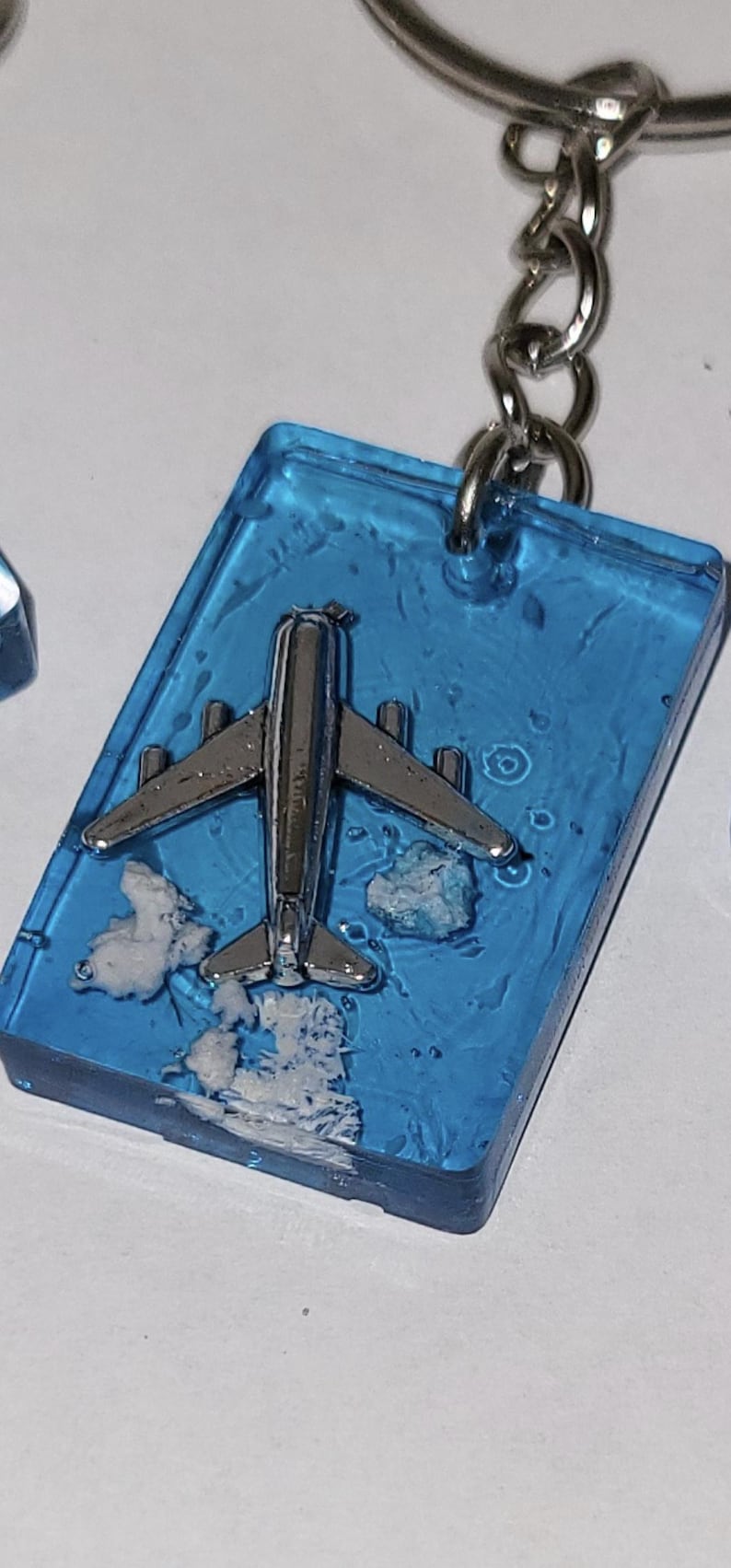 Handmade Epoxy Resin Keychain With Airplane Flying Through Clouds ...