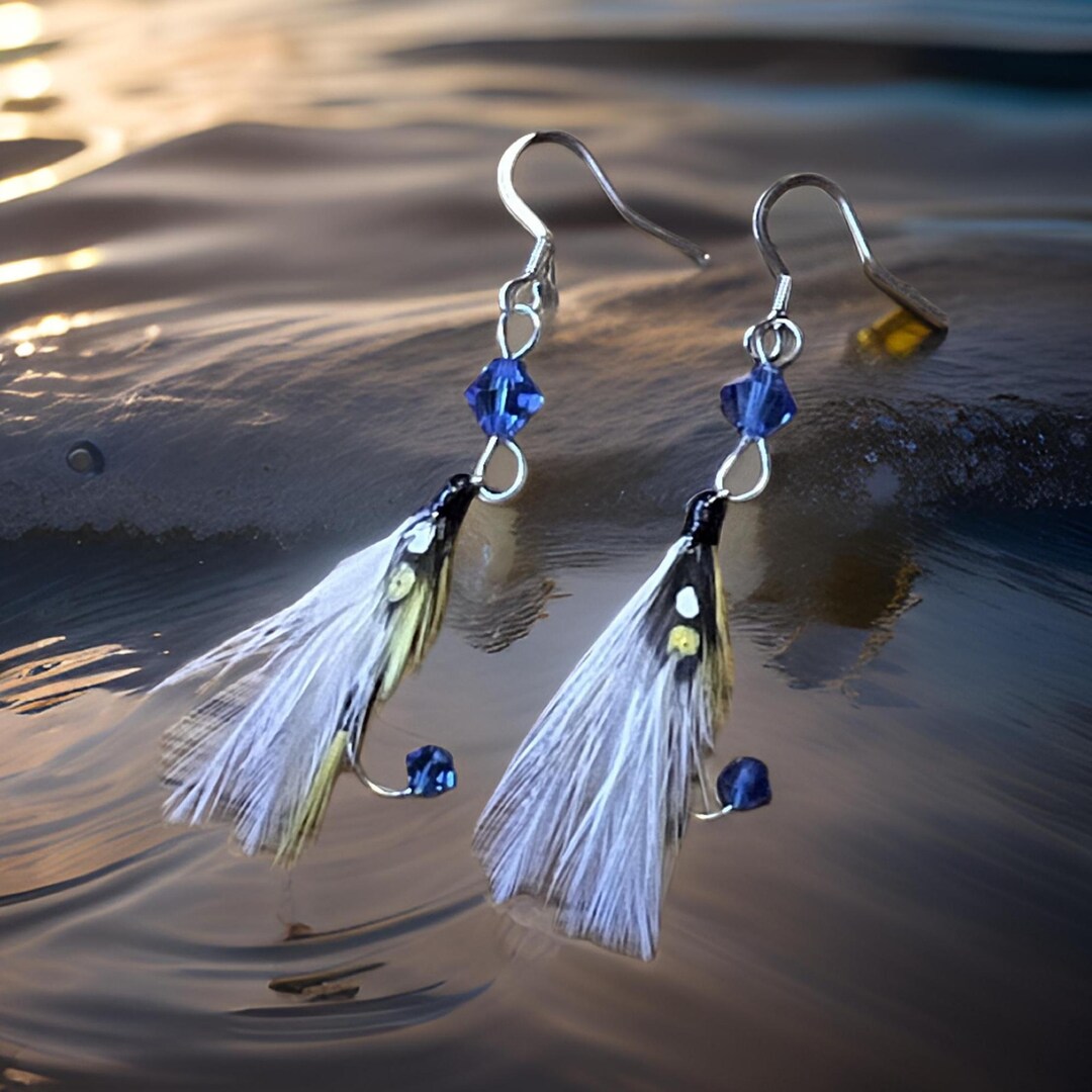 Black Ghost Streamer Fly. Yellow and White Feathers With Brilliant Blue ...