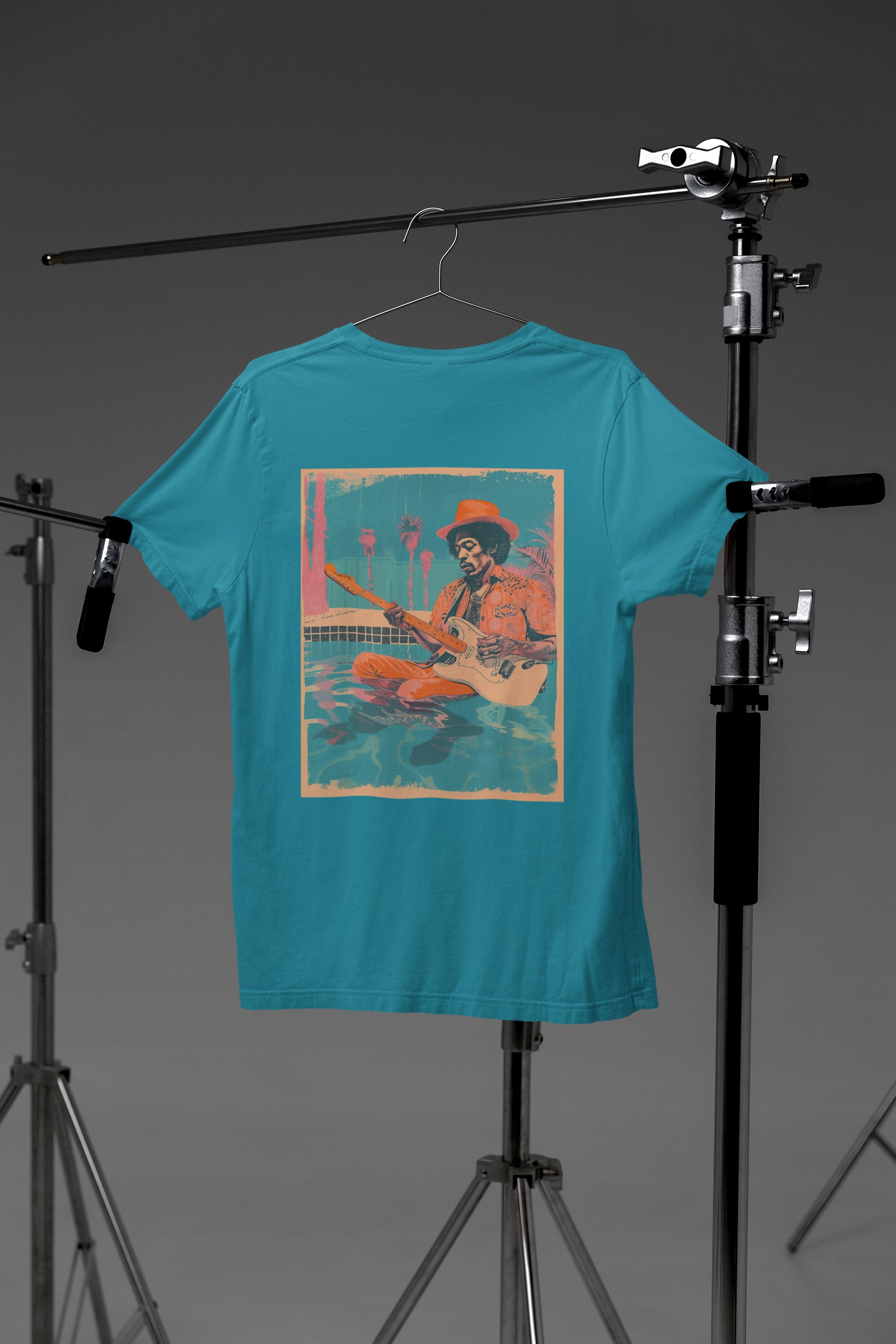 Jimi Hendrix T-shirt | Jimi Hendrix Playing Guitar in a Pool | Vintage ...