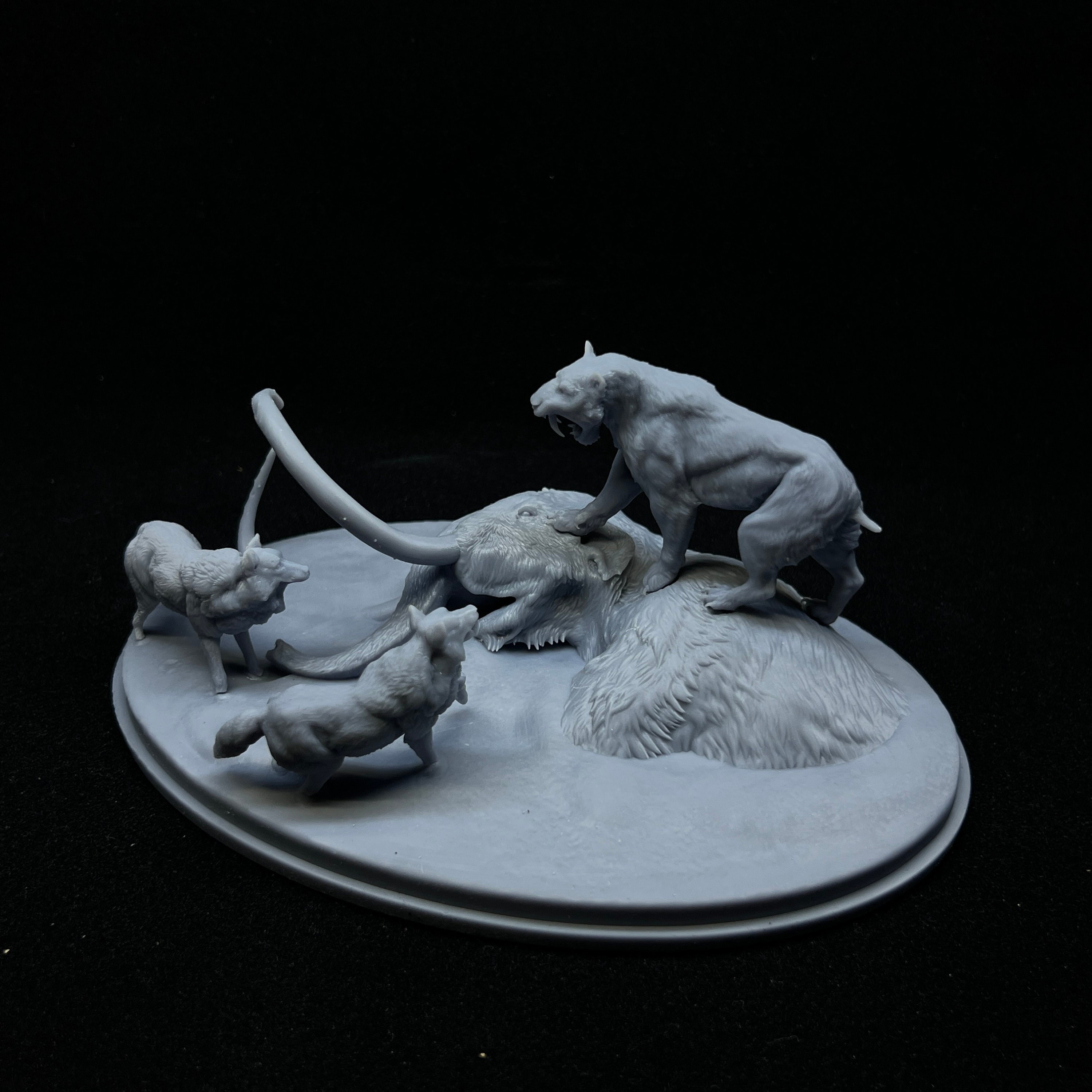 Miniature to Paint of a Smilodon, Dire Wolf, and Mastodon Diorama in ...