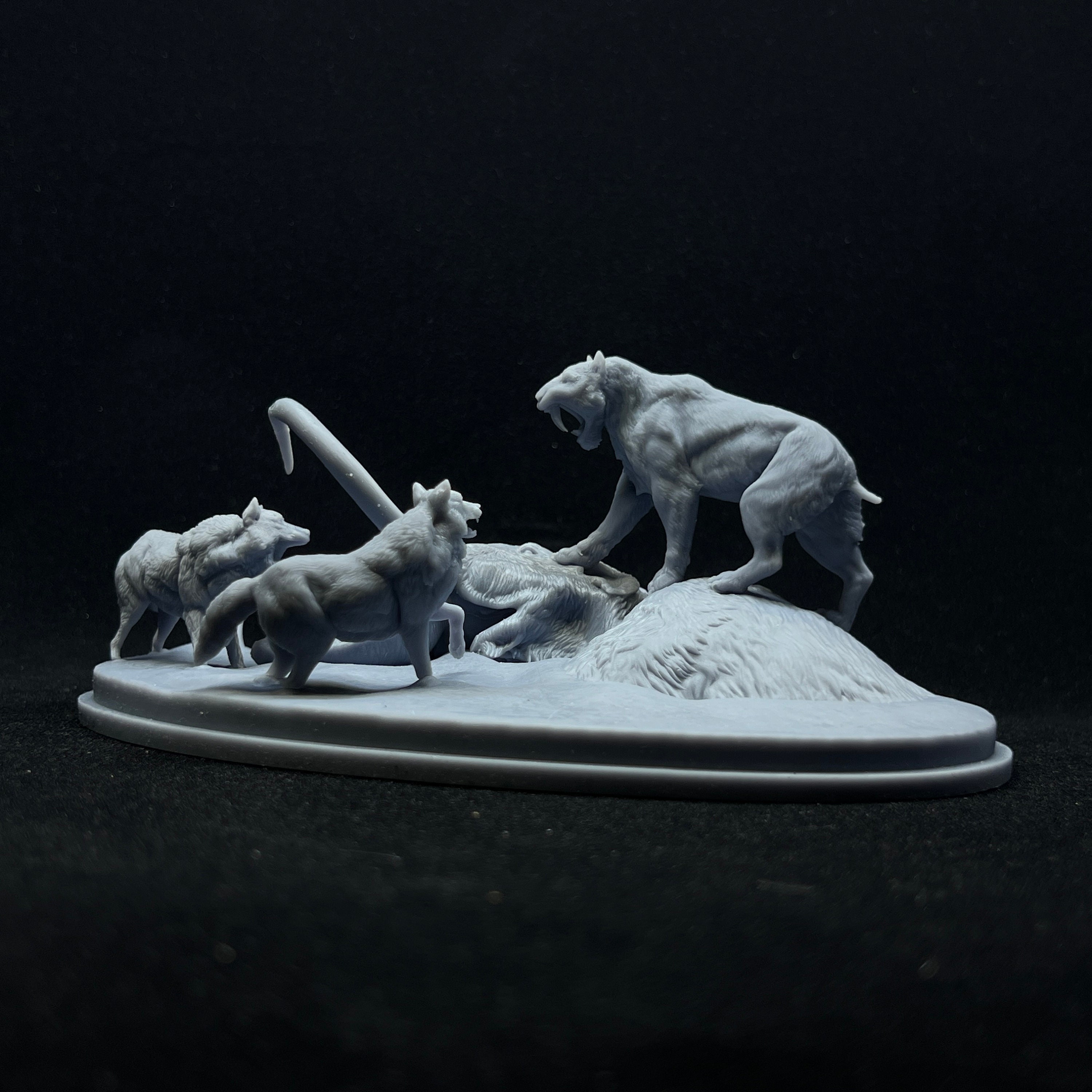 Miniature to Paint of a Smilodon, Dire Wolf, and Mastodon Diorama in ...
