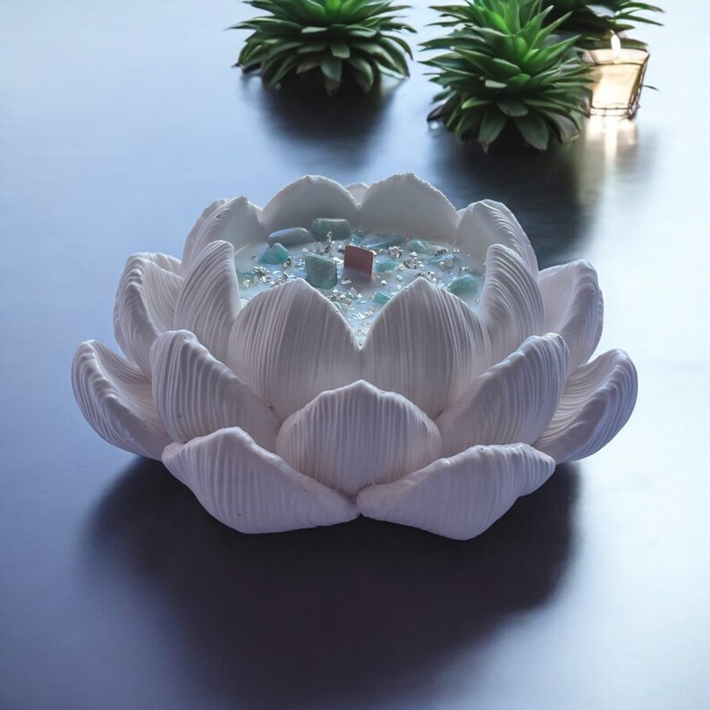A Candle Placed in a Lotus-shaped Planter Adorned With Natural Stones ...