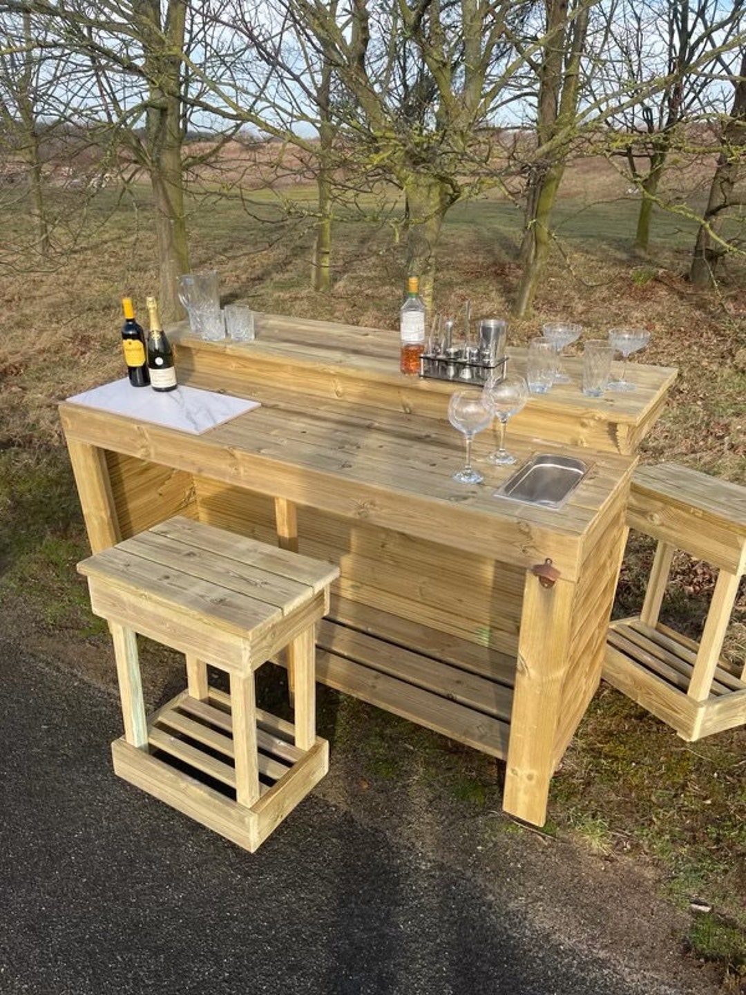 Outdoor entertainment center serving bar store