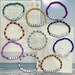 5sos Superhero Bracelets Luke Hemmings Calum Hood Michael Clifford ...