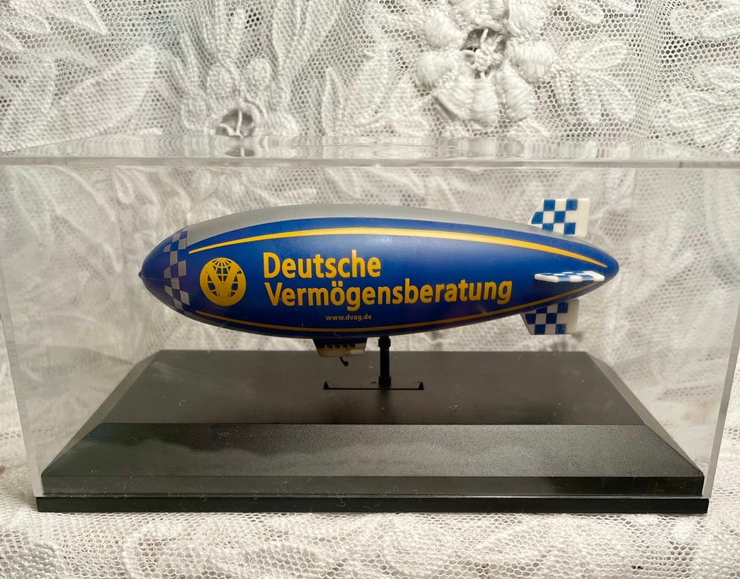 Dirigible Model of the Deutsche Vermohensberatung 4 1/2 “ Long Blue ...
