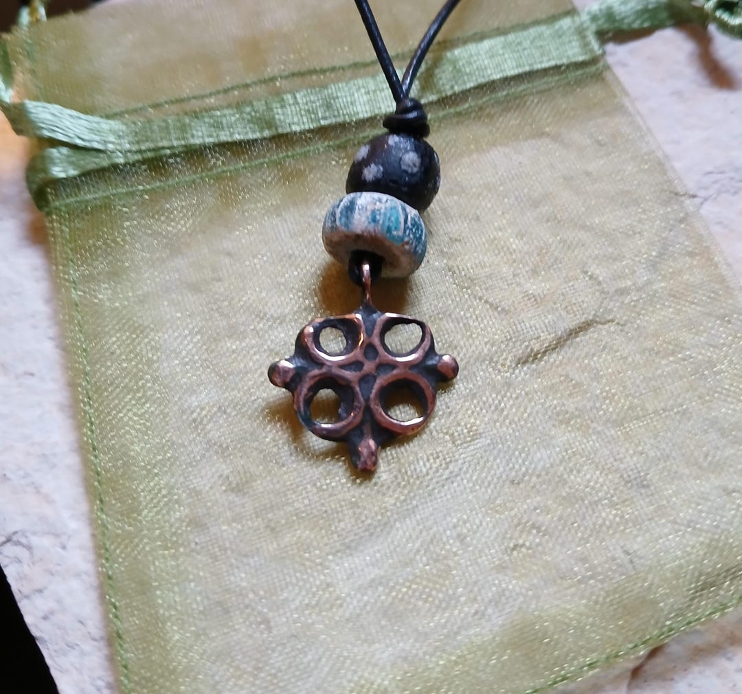 A Bronze Viking Amulet, Polished on One Side, Paired With 1 X Roman ...