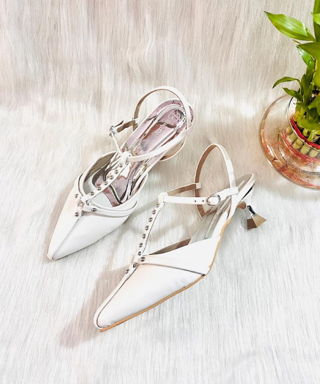 These Timeless White Pumps Exude Sophistication With Their Pointed Toe ...