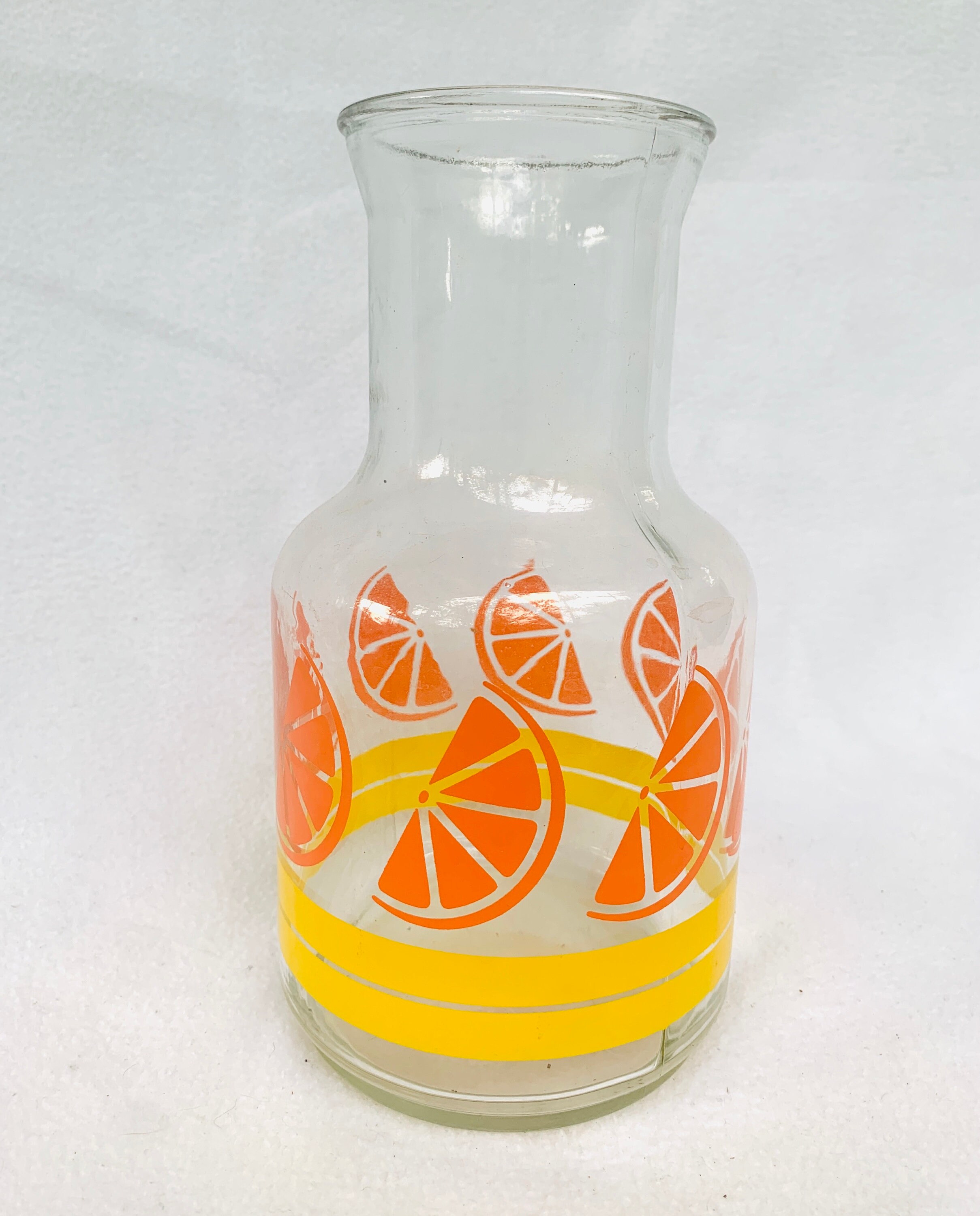 Vintage Orange Juice Container. Orange Slices and Yellow Striped Glass ...