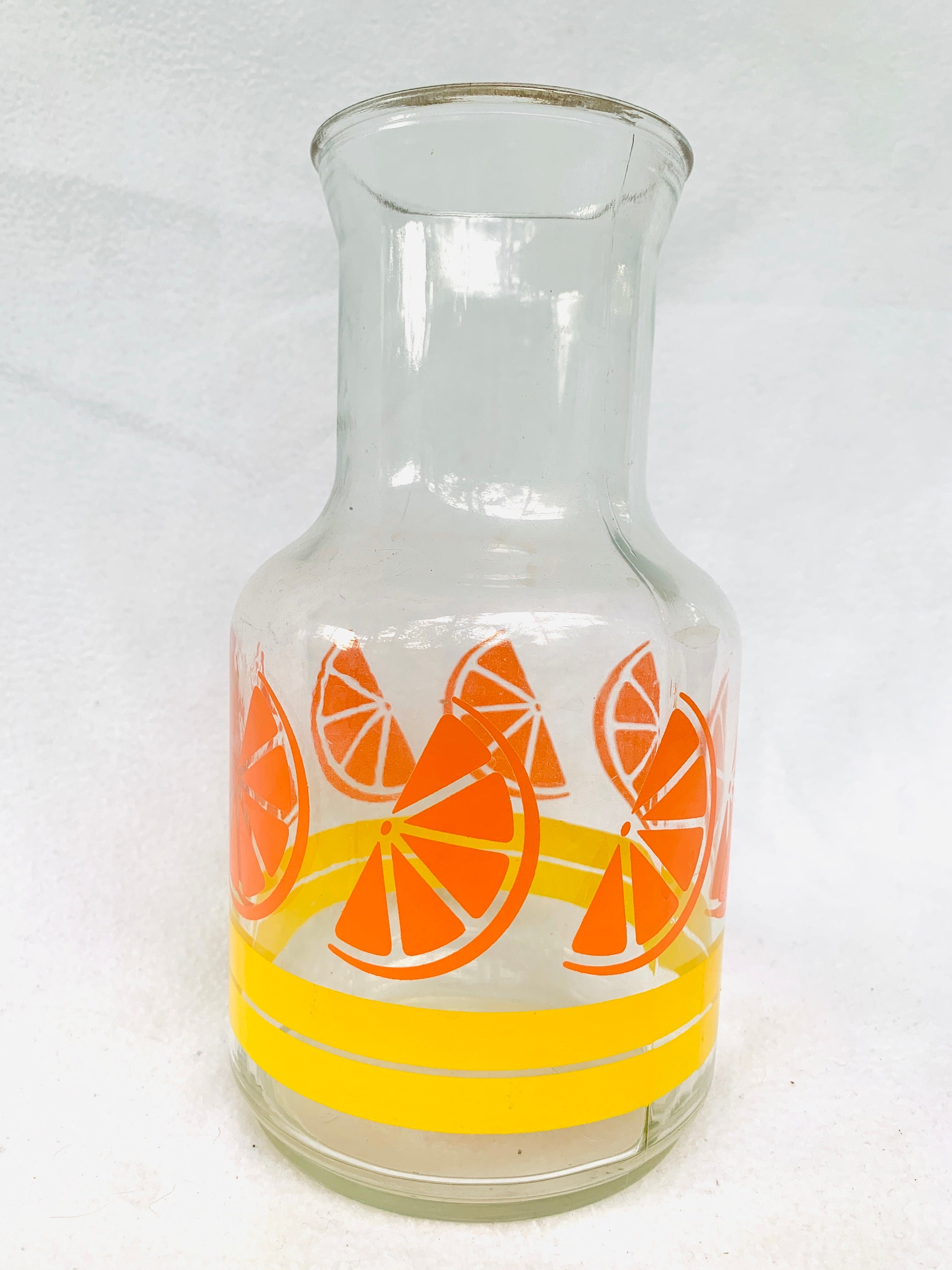 Vintage Orange Juice Container. Orange Slices and Yellow Striped Glass ...