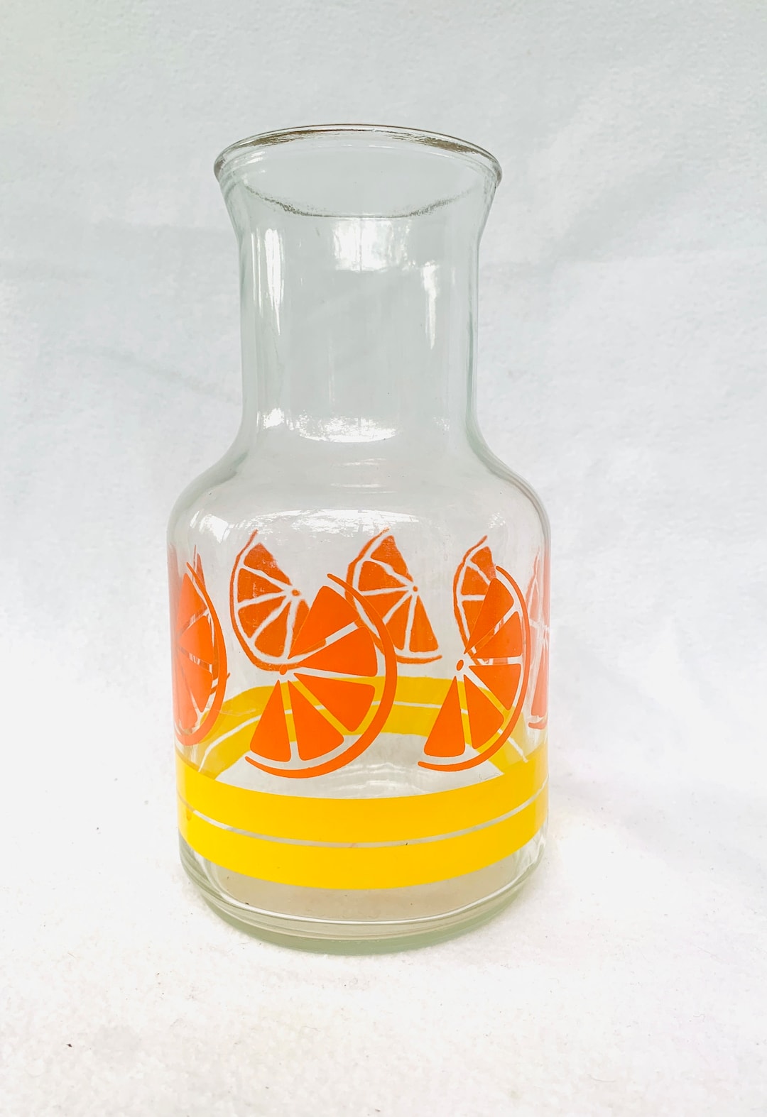 Vintage Orange Juice Container. Orange Slices and Yellow Striped Glass ...