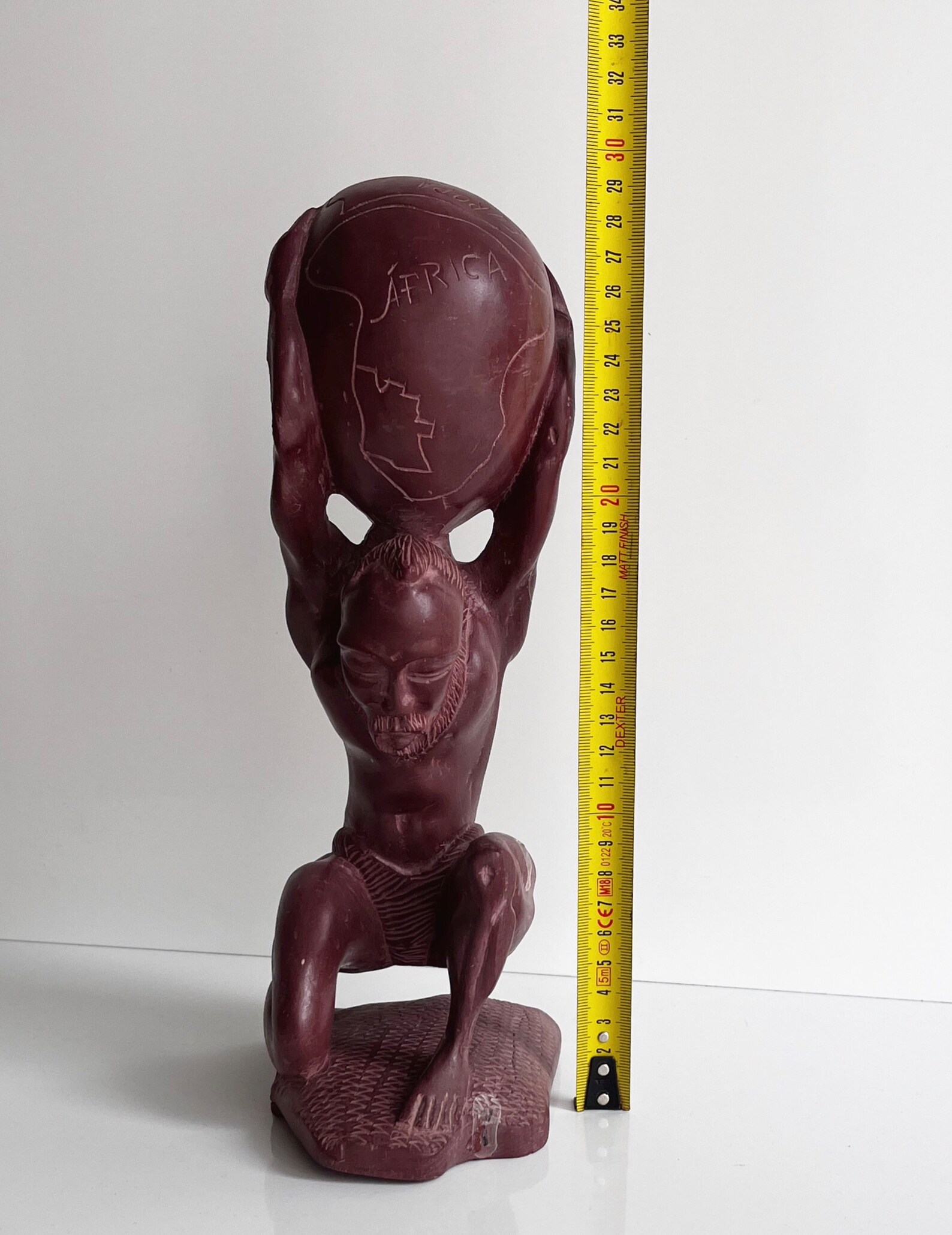 Sculpture of the Greek God Atlas Made of Red Stone. Africa Natural ...