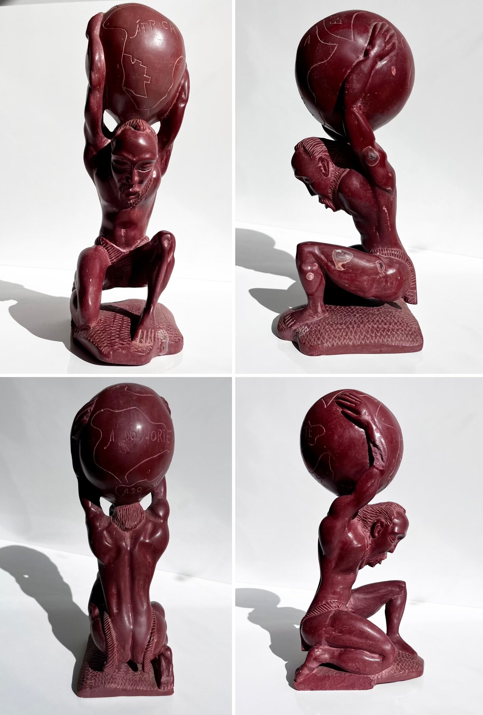 Sculpture of the Greek God Atlas Made of Red Stone. Africa Natural ...