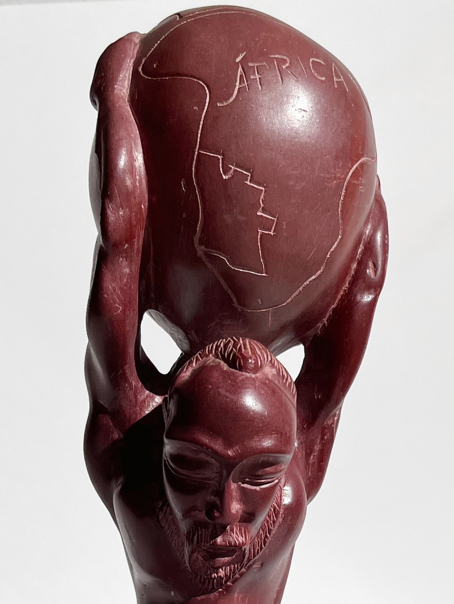 Sculpture of the Greek God Atlas Made of Red Stone. Africa Natural ...