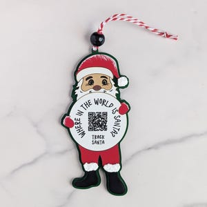 Where in the World is Santa Tracker- Smiling Santa Clause Holding ...