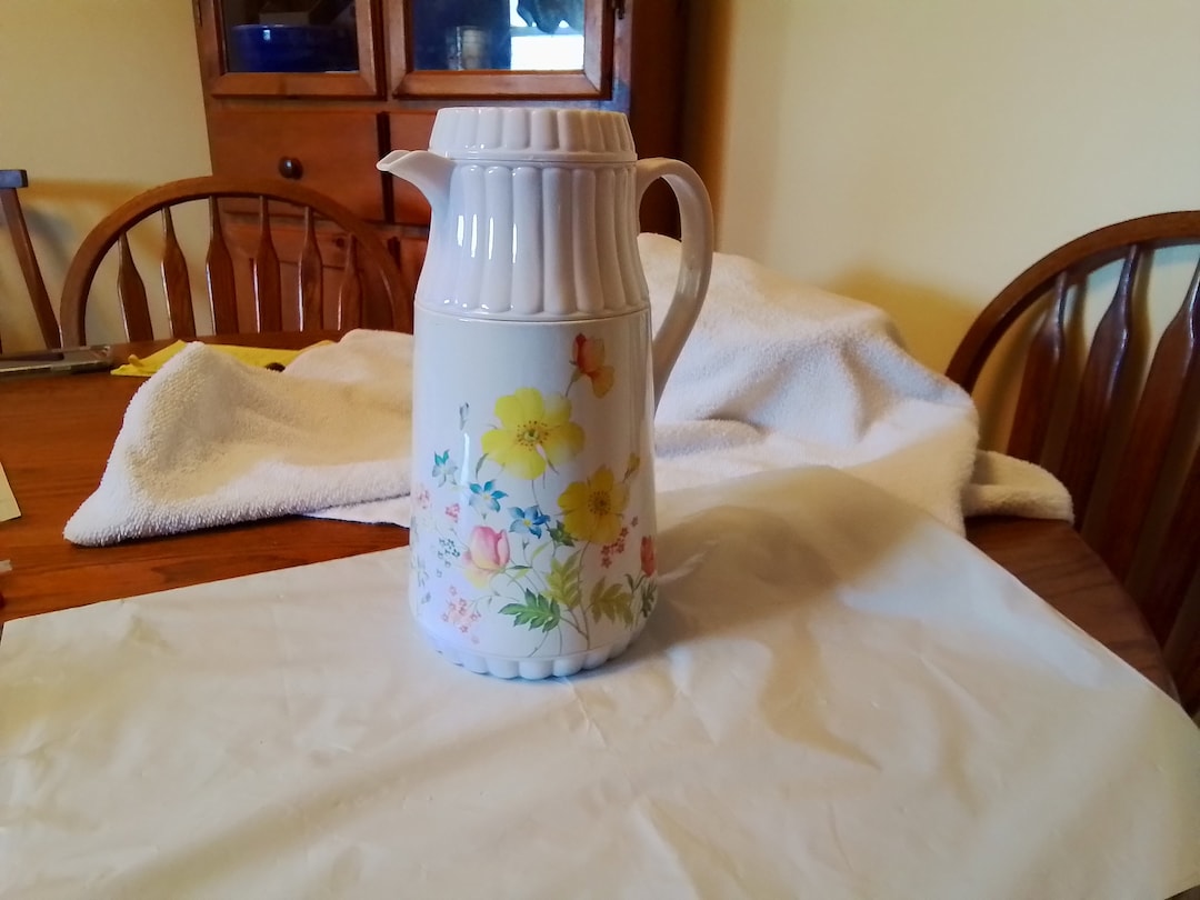 Pitcher Type Hot or Cold Thermos. Yellow,pink and Blue Flowers on White ...