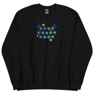 Live, Laugh, Leon Kennedy - RE2 Welcome Banner - Besticktes Unisex ...