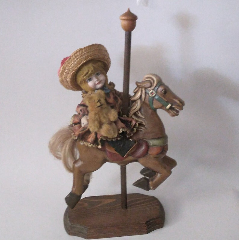 An Original of Sunny Smith Horse Figure With Girl Riding and Holding a ...