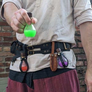 Glowing Light Elixir in Small Potion Bottle With Leather - Etsy