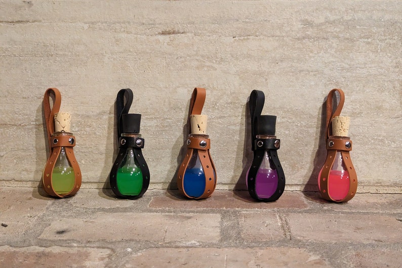 Glowing Light Elixir in Small Potion Bottle With Leather - Etsy