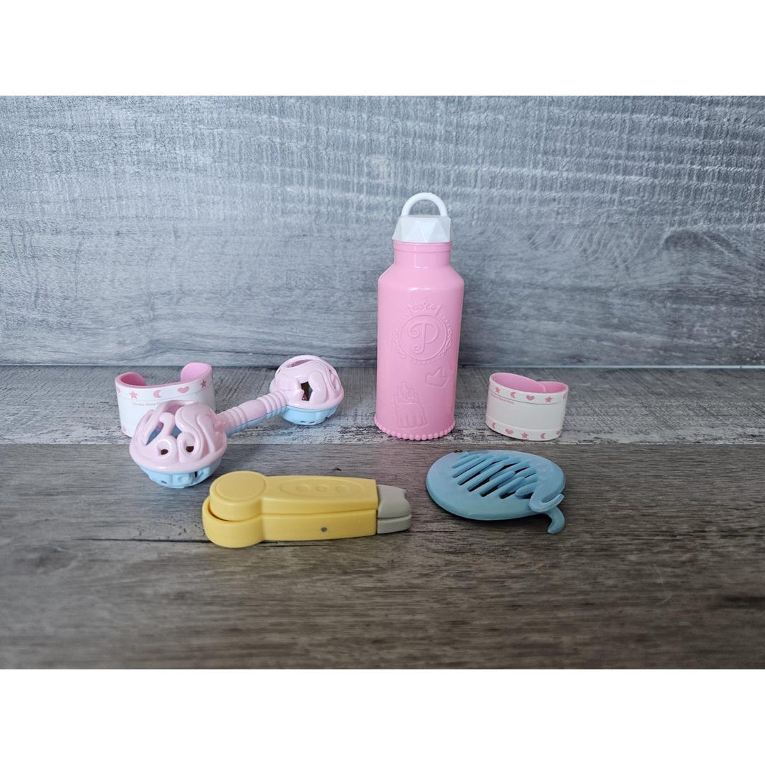 Lot of Baby Doll Items, Bottle, Toys, Nail Clipper & Hair Accessories ...