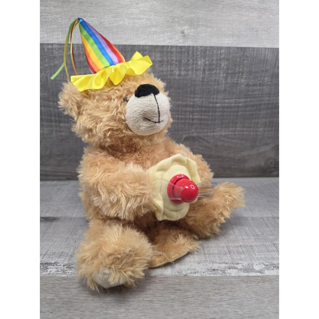 Carlton Cards Singing Birthday Plush Bear Light up Fan Spinning Cupcake ...